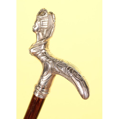 A French silver mounted walking stick, the shaped Rococo handle in the ...