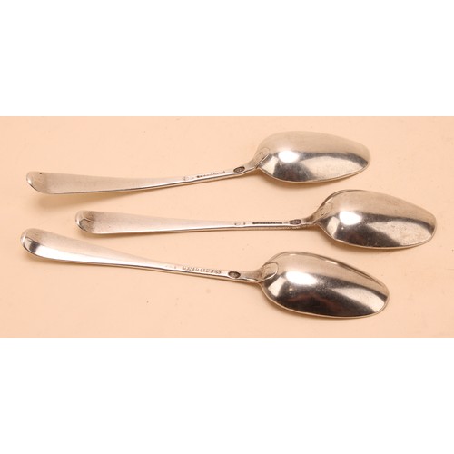 A set of three George III Irish provincial spoons, bright-cut engraved ...