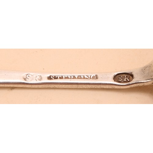 A set of three George III Irish provincial spoons, bright-cut engraved ...