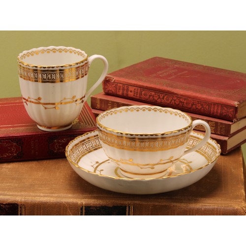 A Derby fluted trio, decorated in gilt, pattern 53, the saucer 14.5cm ...