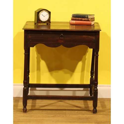 A William III oak side table, oversailing two-plank top above a frieze ...