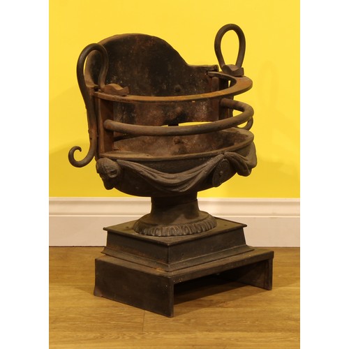 A 19th century cast iron coal grate or fire basket, 57cm high, 55cm ...