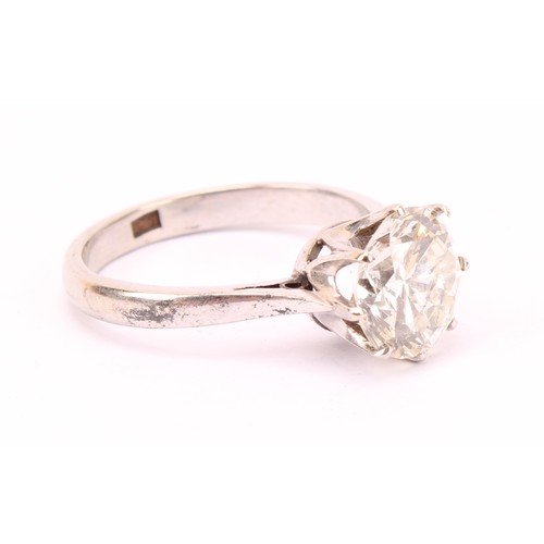 An 18ct white gold diamond solitaire ring, set with an approx. 1.75ct ...