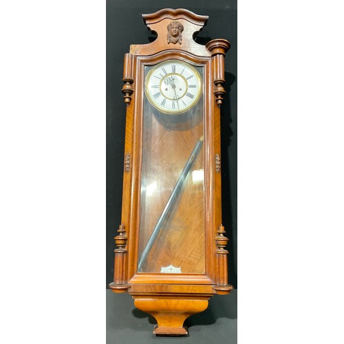 A Vienna wall clock, weights, pendulum and some finials