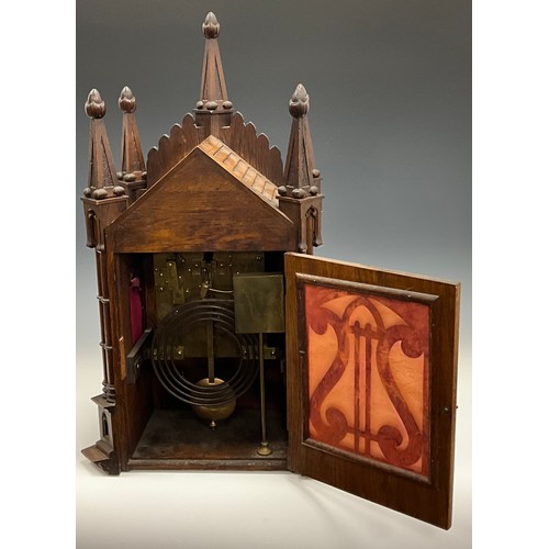 A Winterhalder and Hofmeier Gothic Revival Oak Bracket Clock, the ...