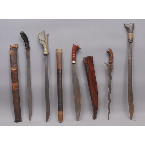 A Mindanao moro barong sword, 38cm single-edged leaf shaped blade ...
