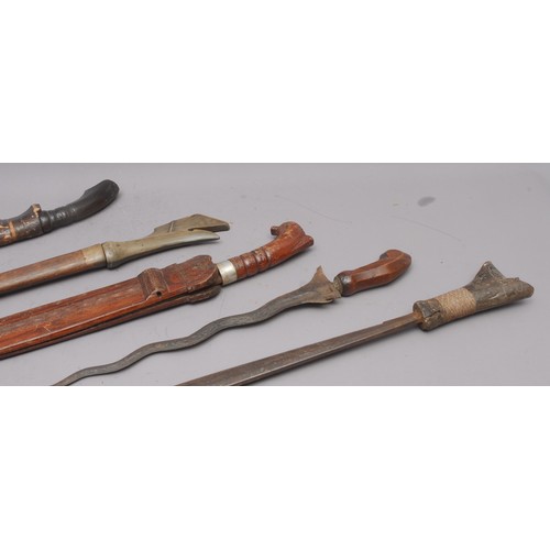 A Mindanao moro barong sword, 38cm single-edged leaf shaped blade ...