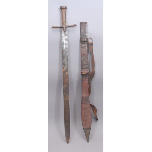 Tribal Art - A Sudanese Kaskara sword, the 65cm double edged, single ...