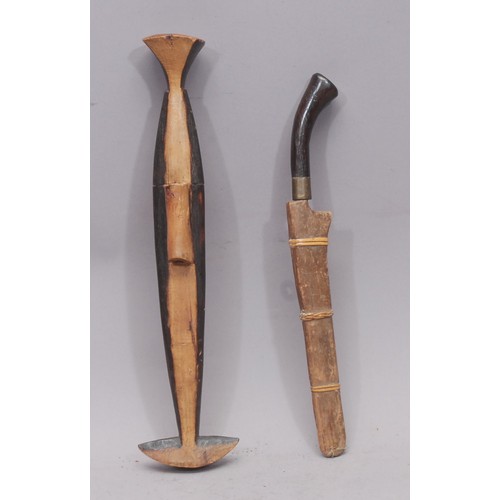 Tribal Art - a South African Ovambo dagger, softwood hilt, the scabbard ...