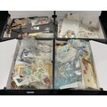 4 file boxes full of stamps , on off paper ex dealers sorter