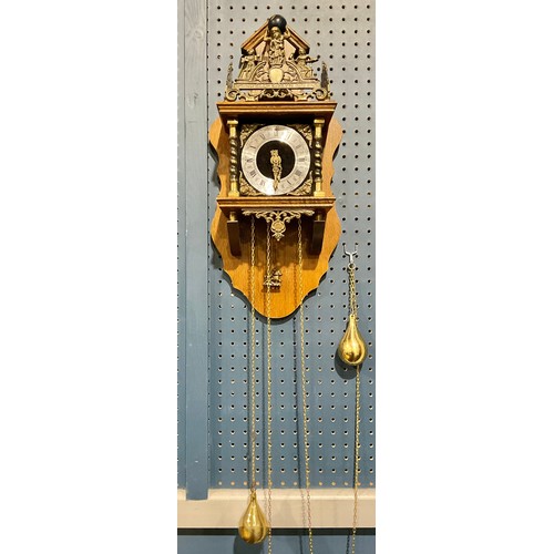 A Frans Hermle atlas clock timepiece, twin weight movement