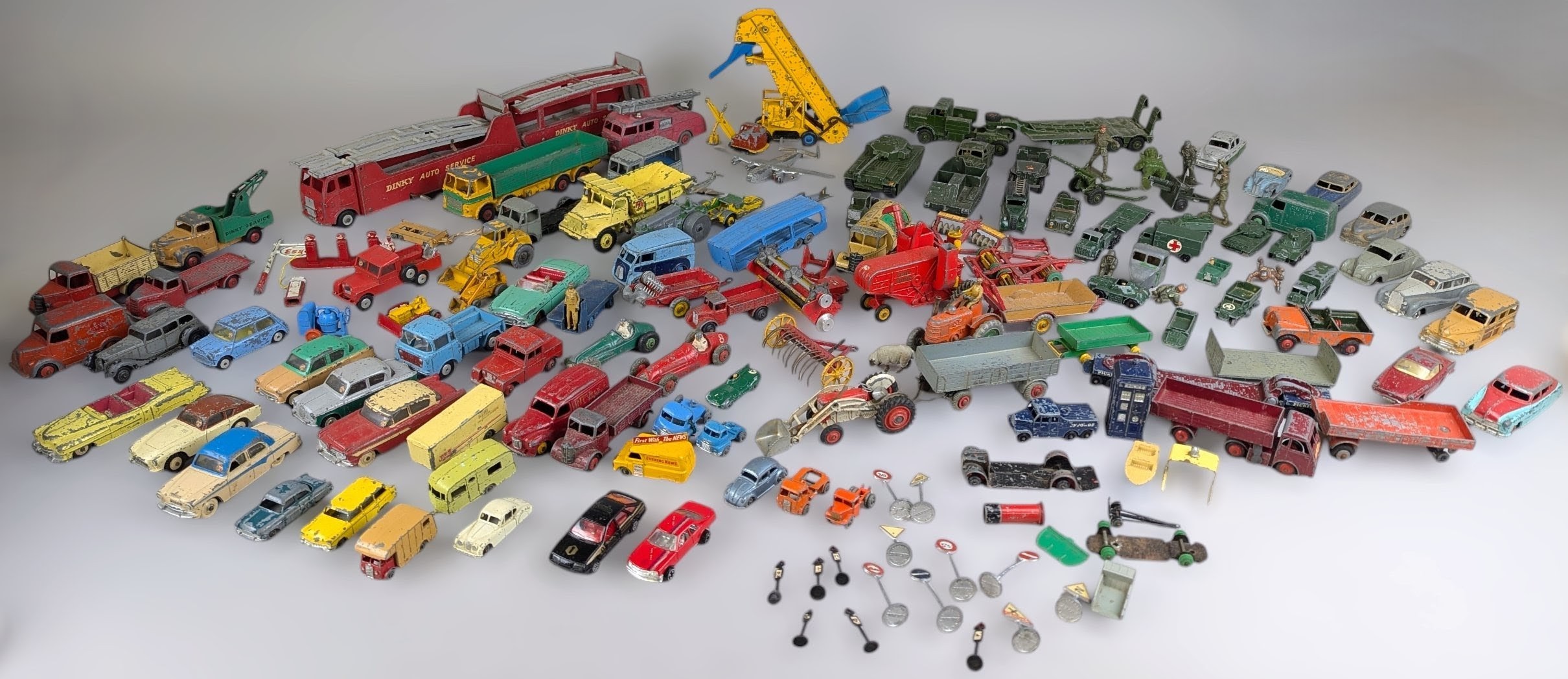 A large childhood collection of loose playworn Dinky diecast vehicles ...