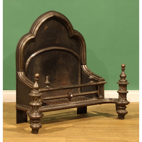 A substantial Gothic Revival cast iron fire basket, architectural ...