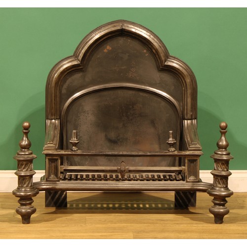 A substantial Gothic Revival cast iron fire basket, architectural ...