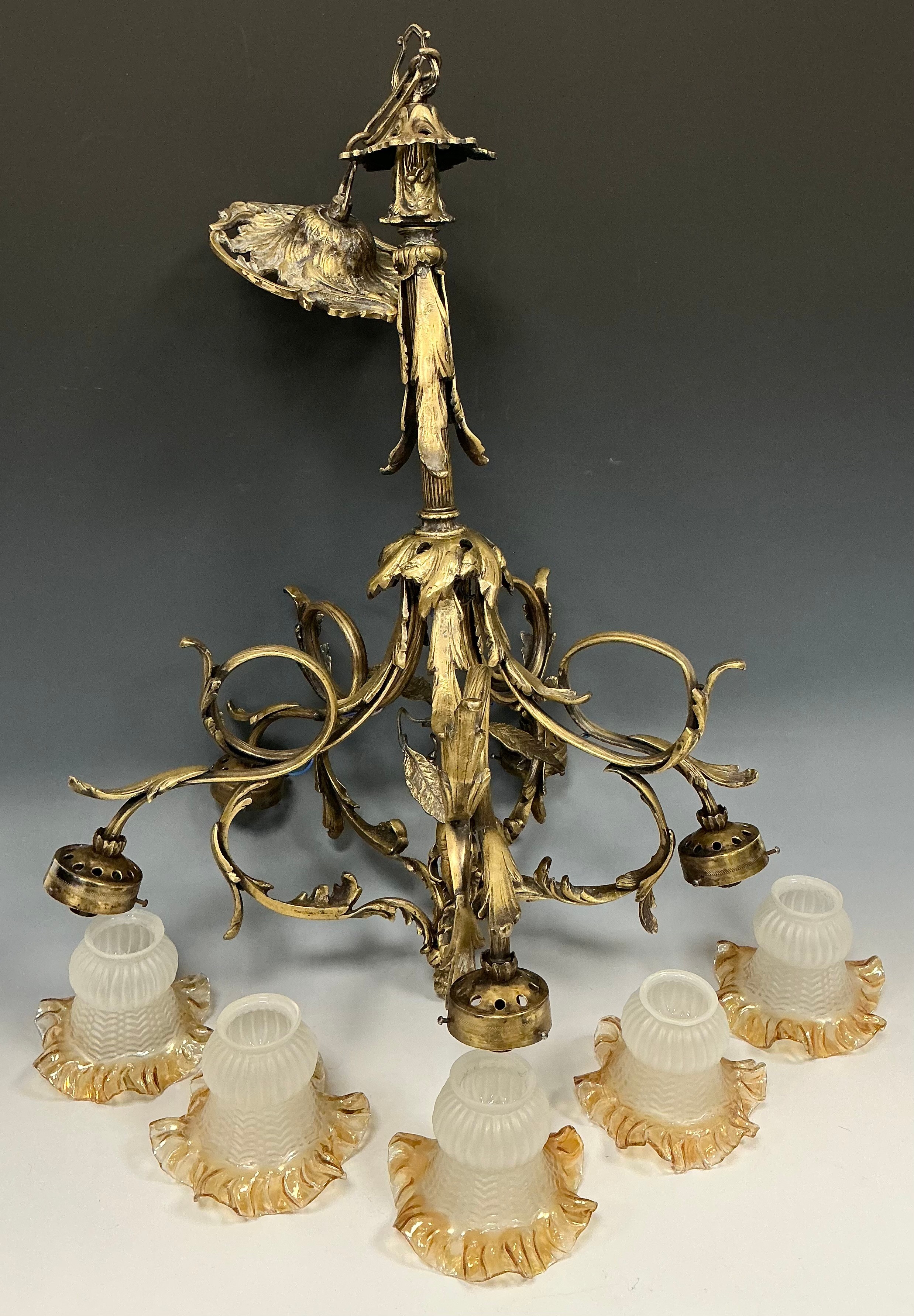 A Louis XV Revival brass five-light electrolier, fluted column applied ...