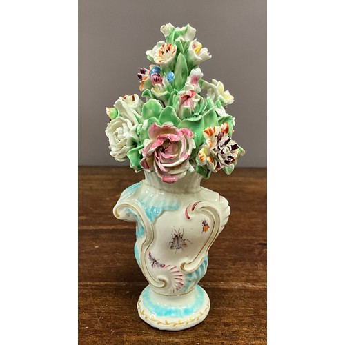 An 18th century Derby rococo scroll flower vase of asymmetrical form ...
