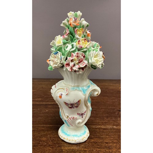 An 18th century Derby rococo scroll flower vase of asymmetrical form ...
