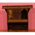 Liberty & Co - an Arts and Crafts wall hanging cabinet, oversailing ...