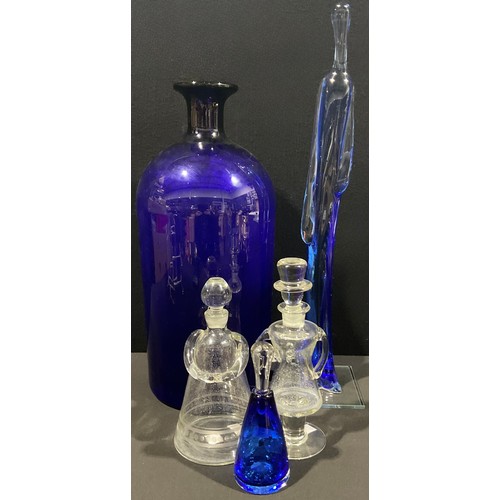 A large art glass figure, of slender form, in blue, 54cm high; a pair ...
