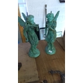 Pair of cast iron patinated statues, depicting winged figures in ...