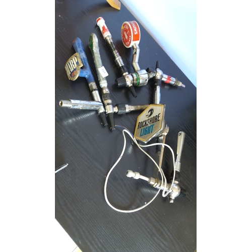 Five vintage beer taps including Harp, Smithwick's Ale, Rockshore Light ...