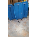 Set of three Radbug blue foam bodyboards, each fitted with coiled wrist ...