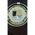 Original round printed metal drinks tray for Guinness, decorated with ...