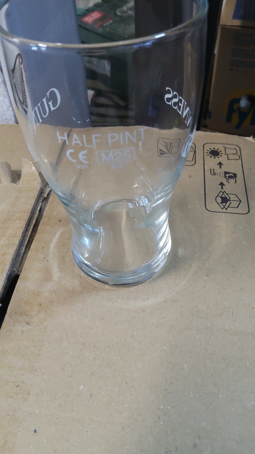 Box of 24 Guinness half pint glasses.