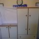Modern wardrobe with attached chest of drawers