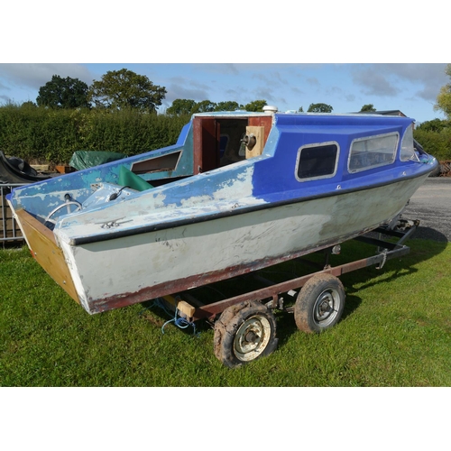 Fishing boat on trailer - burst back tyre