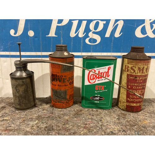 3 Oil cans and 1 oil dispenser to include Castrol and Delco