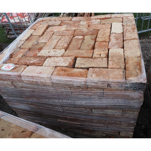 Pallet of red bricks