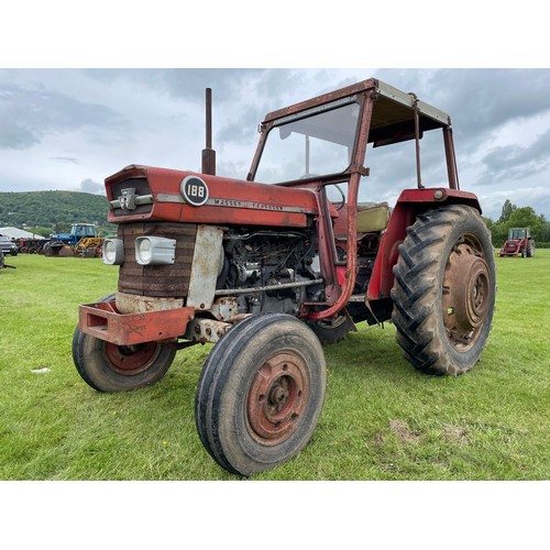 Massey Ferguson 188 tractor. First time starter. PAVT rear wheels, cast ...
