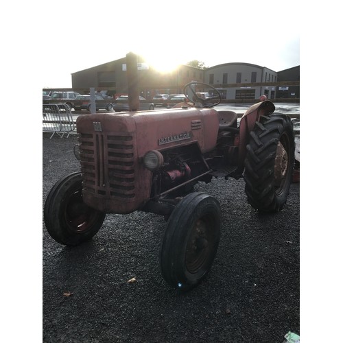 International B250 tractor, early twin steering arm model. C/w buff log ...