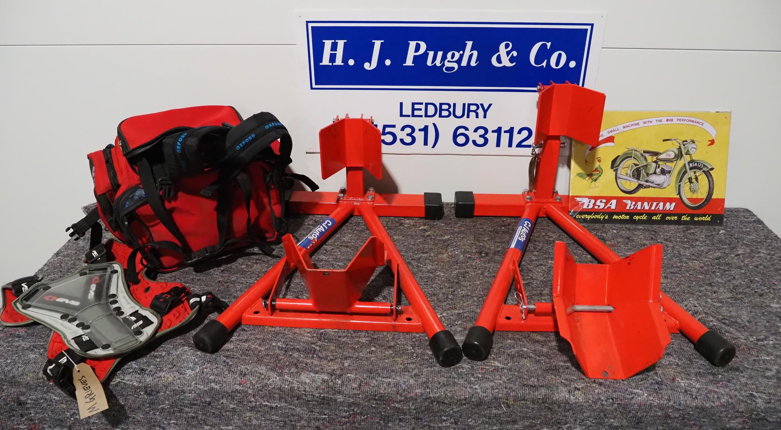 2 Motorcycle stands, BSA tin sign and Pannier bag