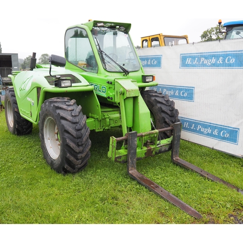 Merlo telehandler P34.7 plus. 2005. 9842 hours showing, off farm. Runs ...