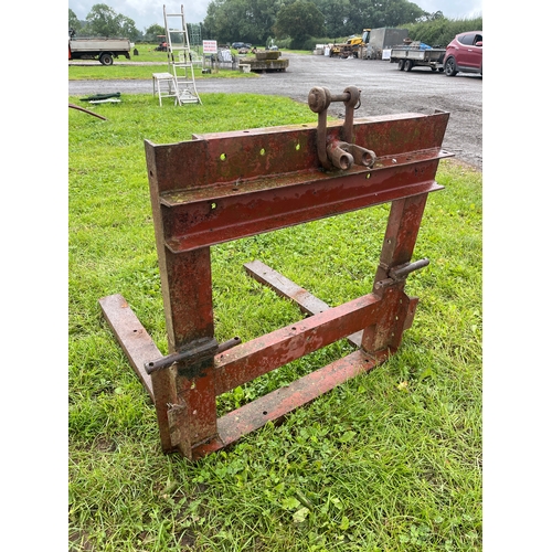 Rear mounted pallet forks