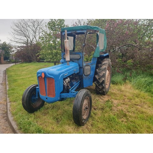 Fordson Dexta tractor. Fitted with cab, runs