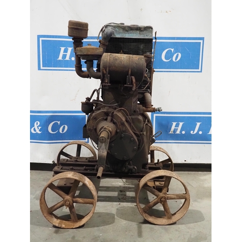 Petter type AV1 5 BHP engine on 4 wheel trolley. S/N 661503