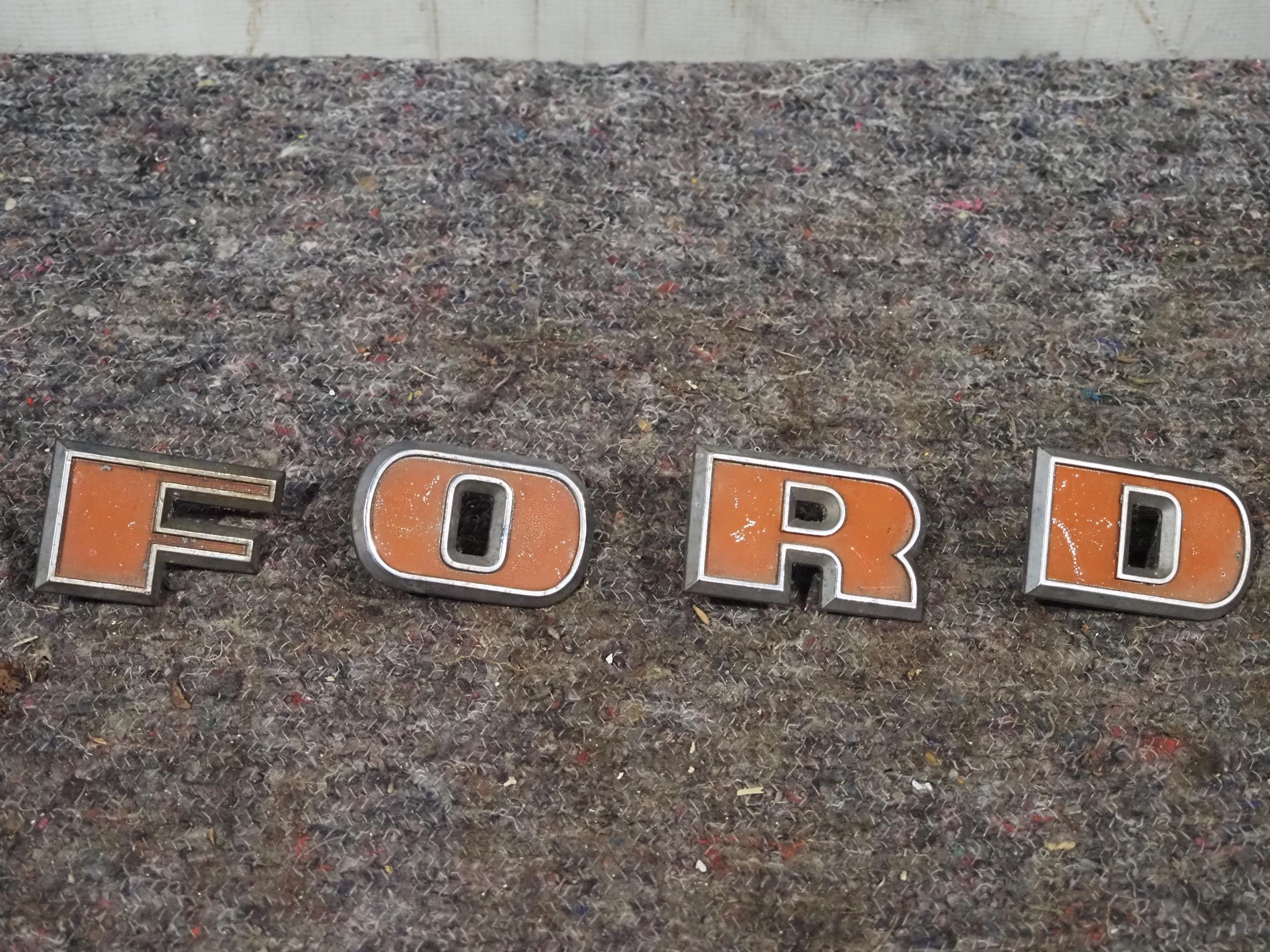 Ford emblems stamped FoMoCo