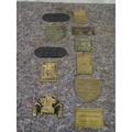 Assorted brass vintage rally plaques