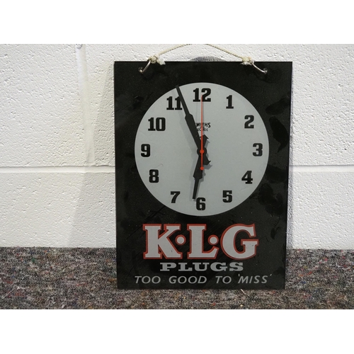 K.L.G Plugs glass clock 14" x 10"