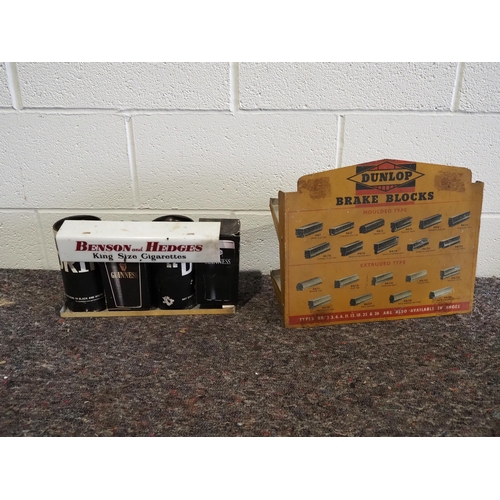 Guinness advertising cups and Dunlop display stand