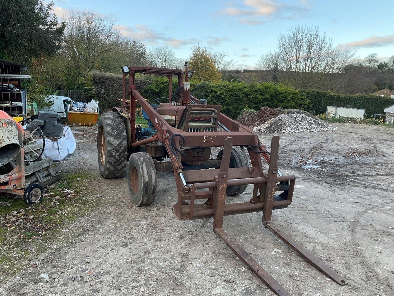 Ford 5000 tractor with Farmhand loader. Had been used in a builders ...