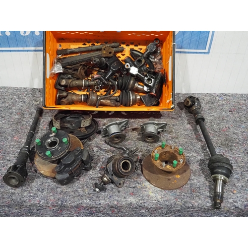 Box of classic Mini shafts and brakes, some NOS