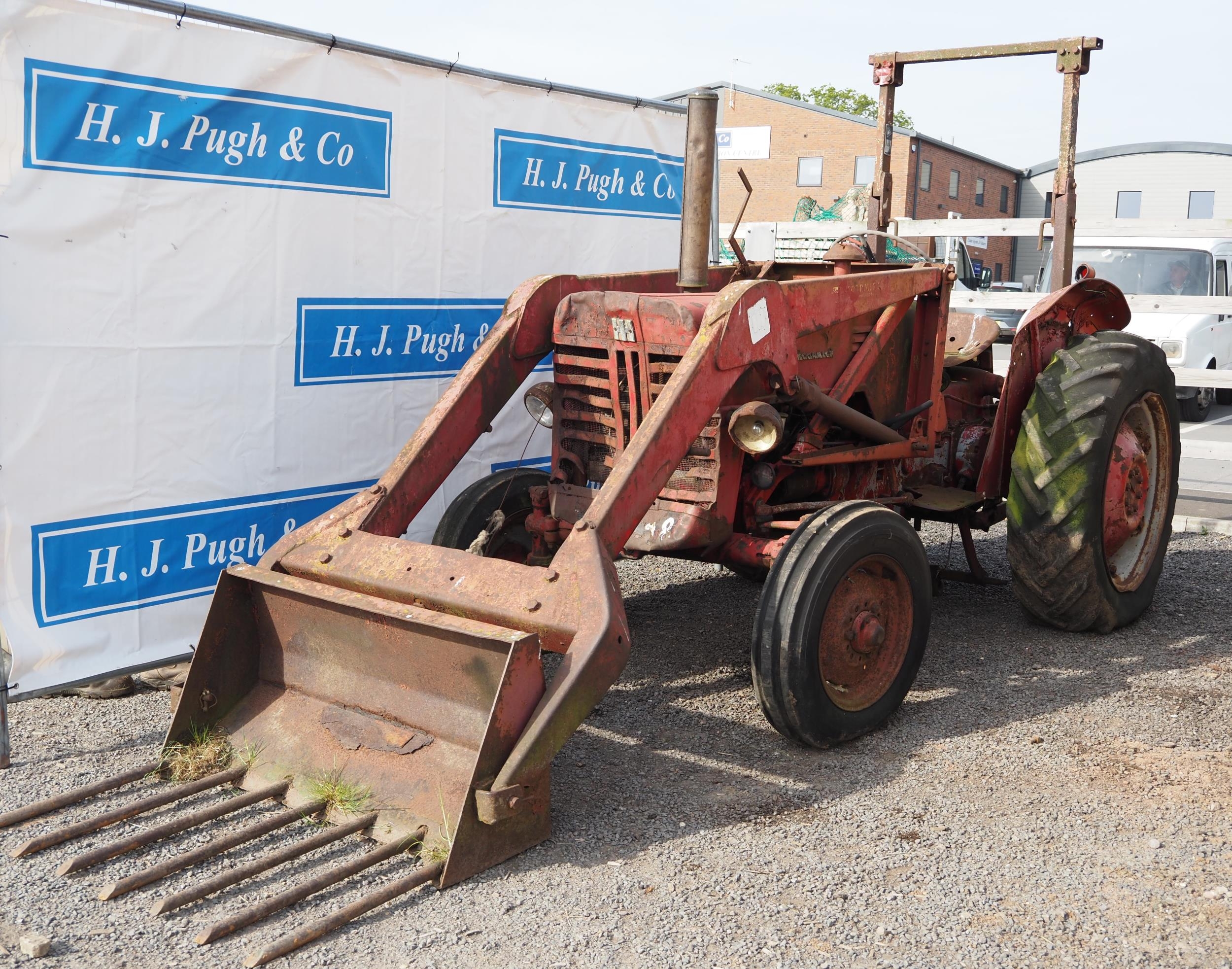 International B275 tractor. C/w loader and roll frame. Reg. SAY 743