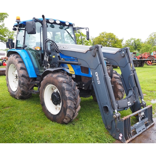 New Holland T5050 4wd tractor with Quicke loader. Showing 2906 hours. Off farm. Runs and drives. Reg