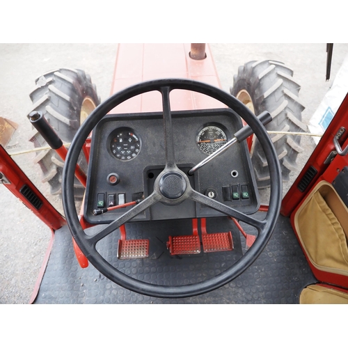 International 1056 XL 4WD tractor. Runs and drives well, showing 8247 ...