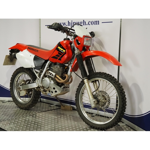Honda XR250R motocross bike. 249cc. 2002. Runs and rides. Showing low ...