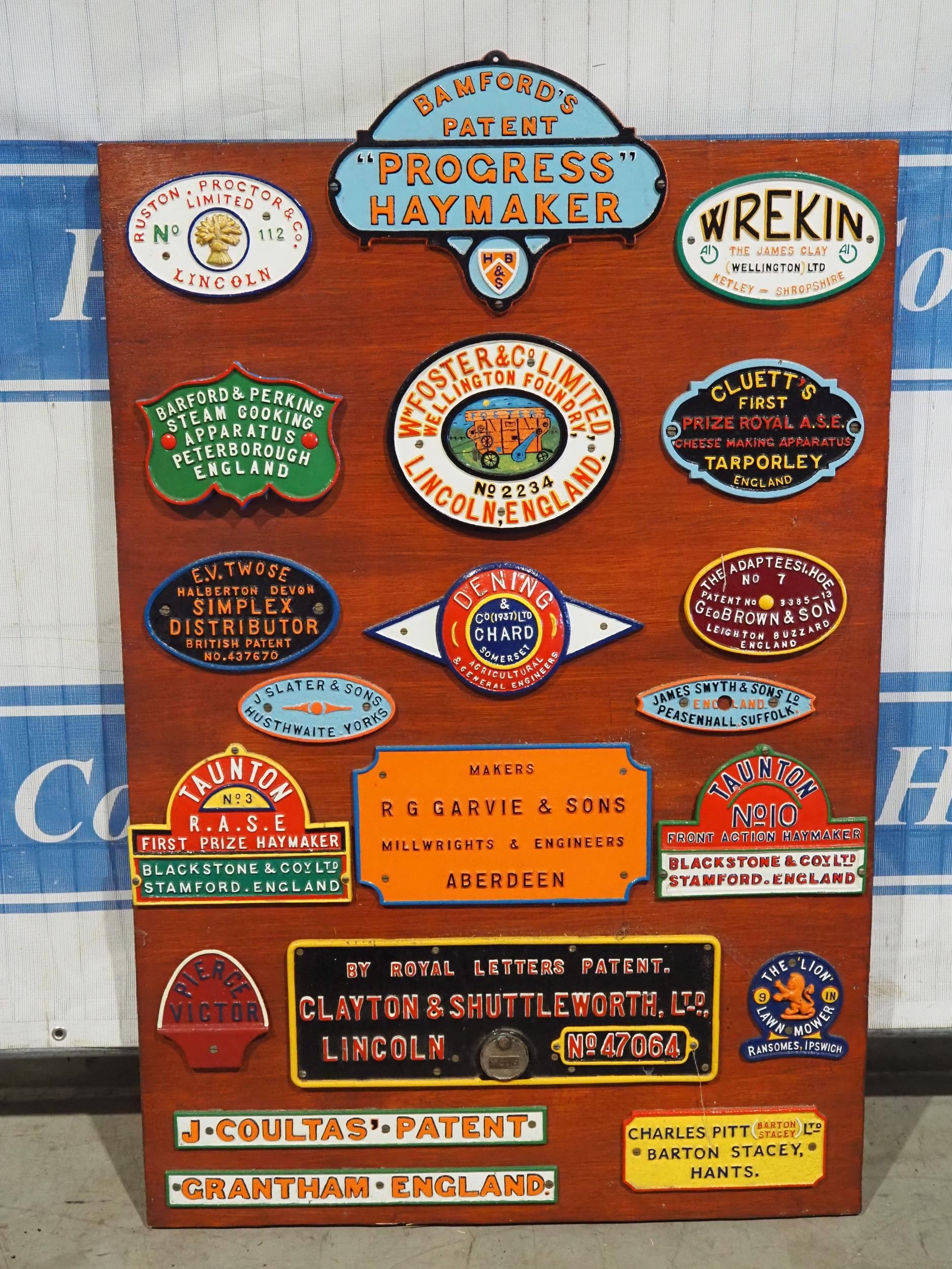 Display board of assorted cast iron name plates to include Wrekin ...